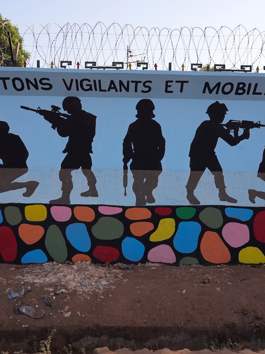 Men in military uniforms kill 60 people as violence intensifies in ...